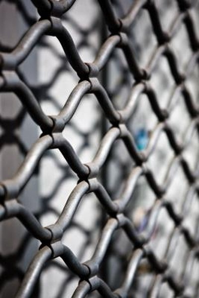 How To Cut Through A Metal Fence HomeSteady how-to-cut-through-a-metal-fence-homesteady